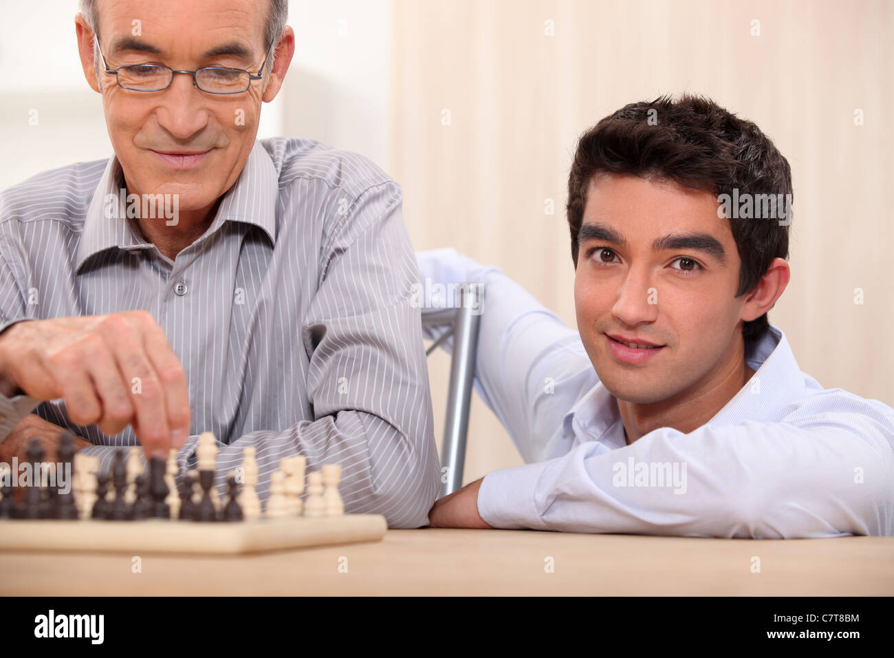 Father son enjoying chess hi-res stock photography and images - Alamy