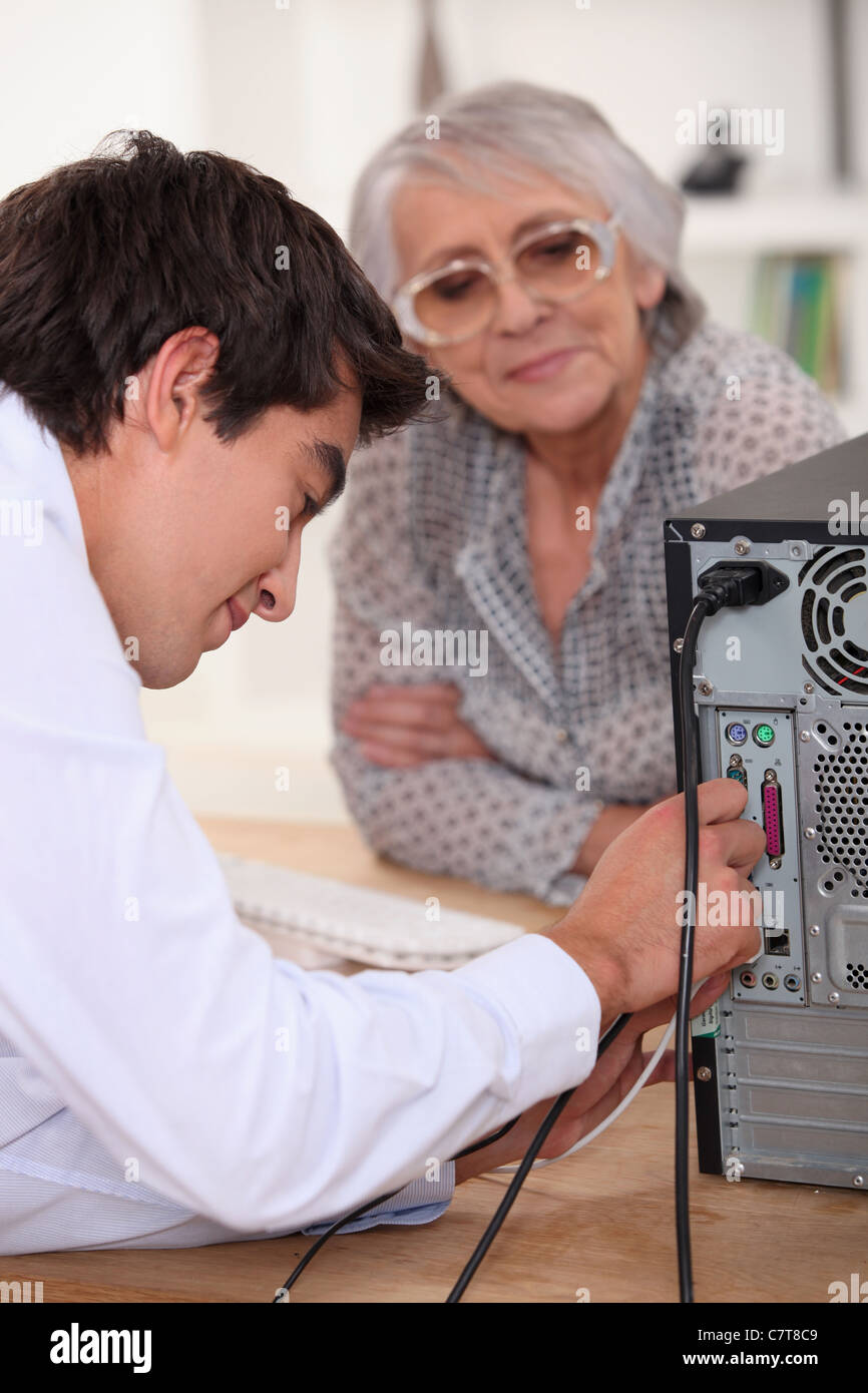 Teenager setting up computer Stock Photo - Alamy