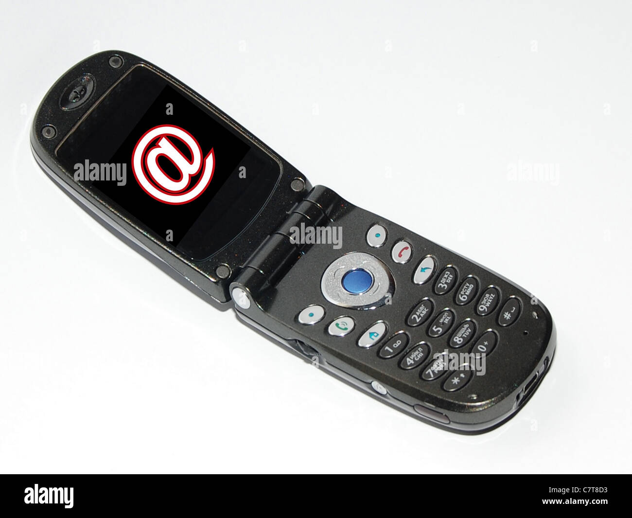 Mobile phone with an email symbol background on the screen.Objects over ...