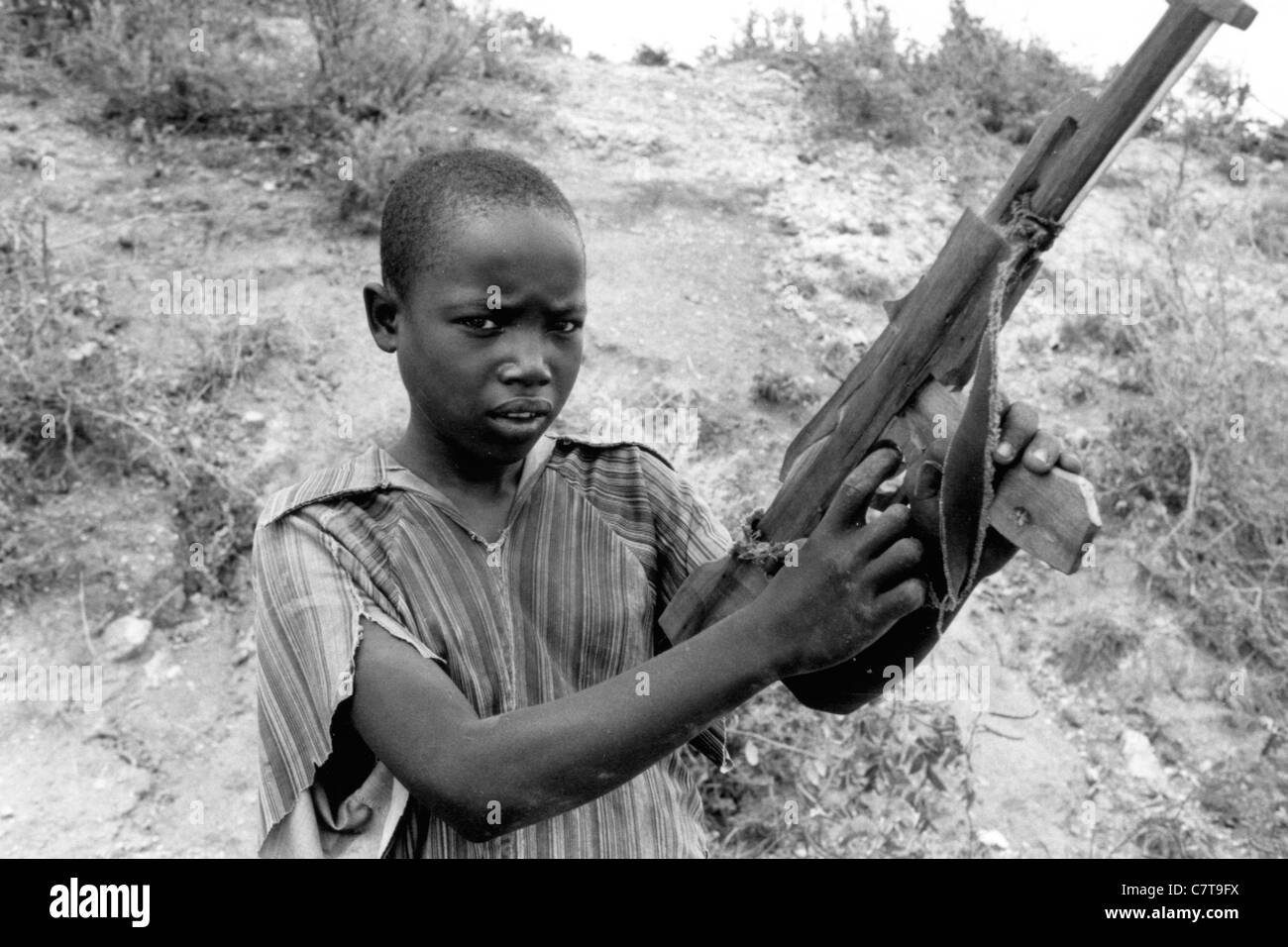 Boy africa gun hi-res stock photography and images - Alamy