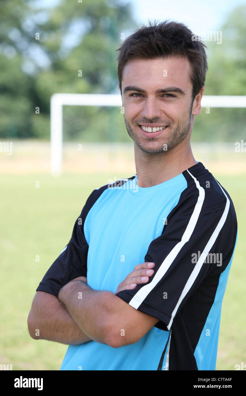 Blue and white football kit hi-res stock photography and images - Alamy