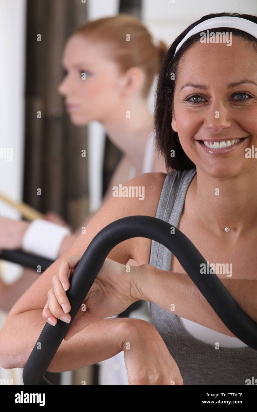 Women working out in a gym Stock Photo - Alamy