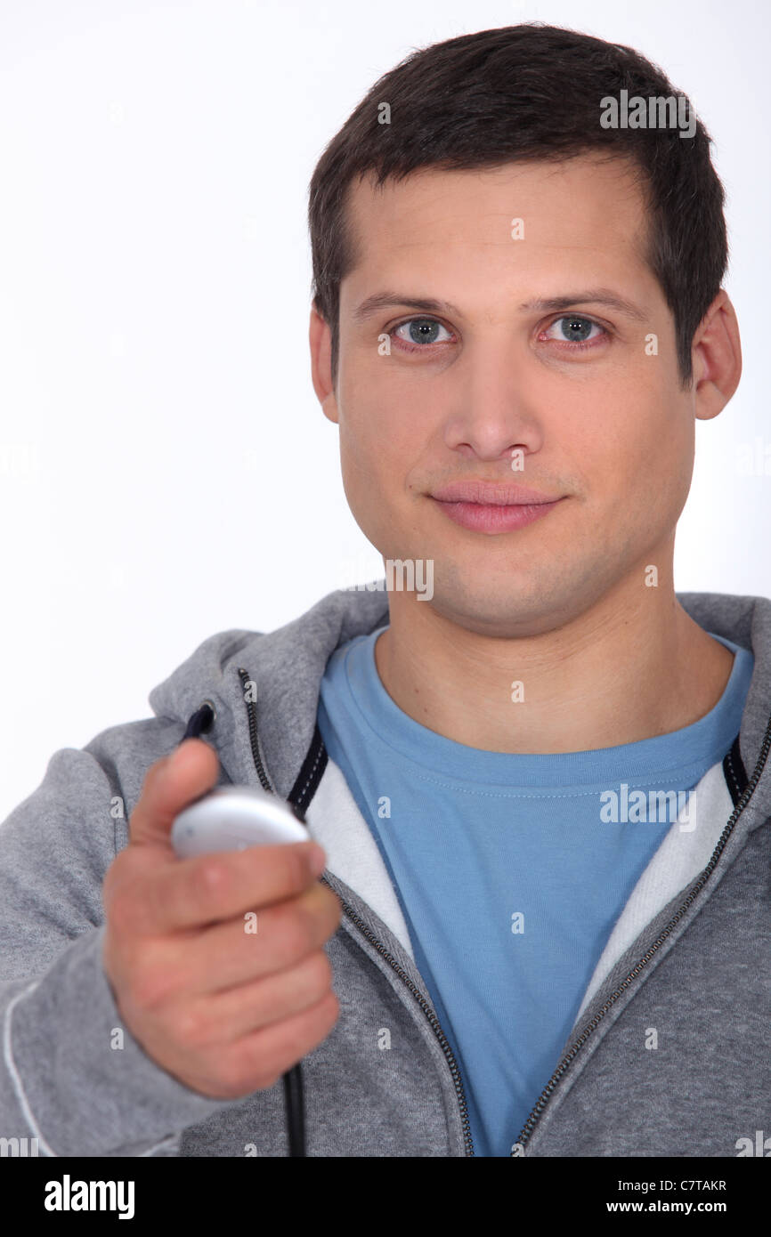young man with stopwatch Stock Photo - Alamy