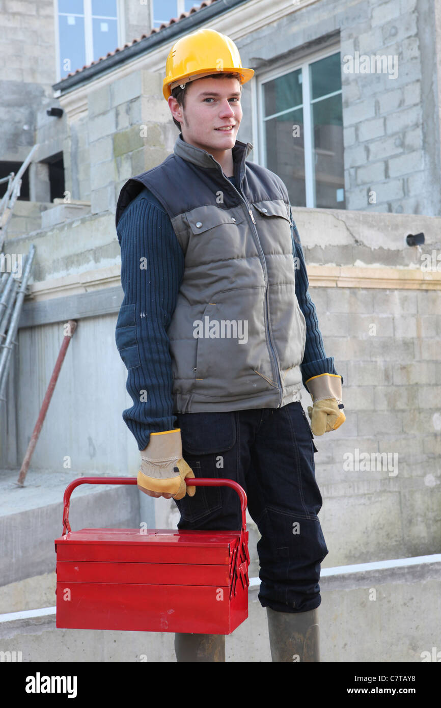 Construction worker arriving at work Stock Photo - Alamy