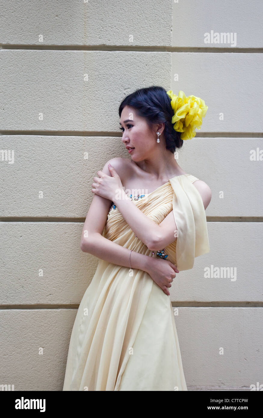 Chinese girl posing for a photograph in Guangzhou Stock Photo - Alamy