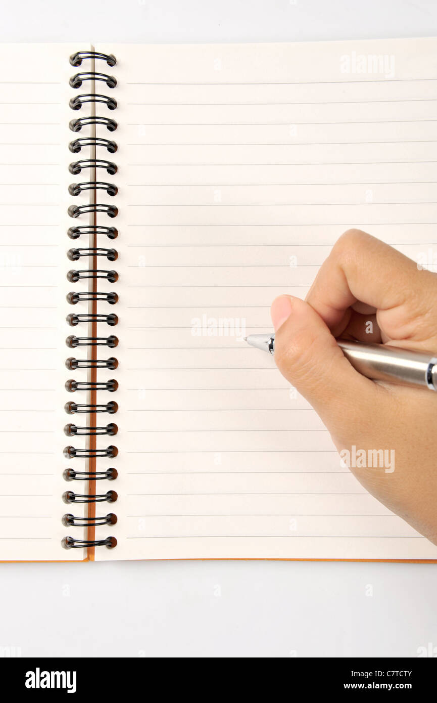 Notebook in hand. Pen in hand. Isolated on white background Stock Photo ...