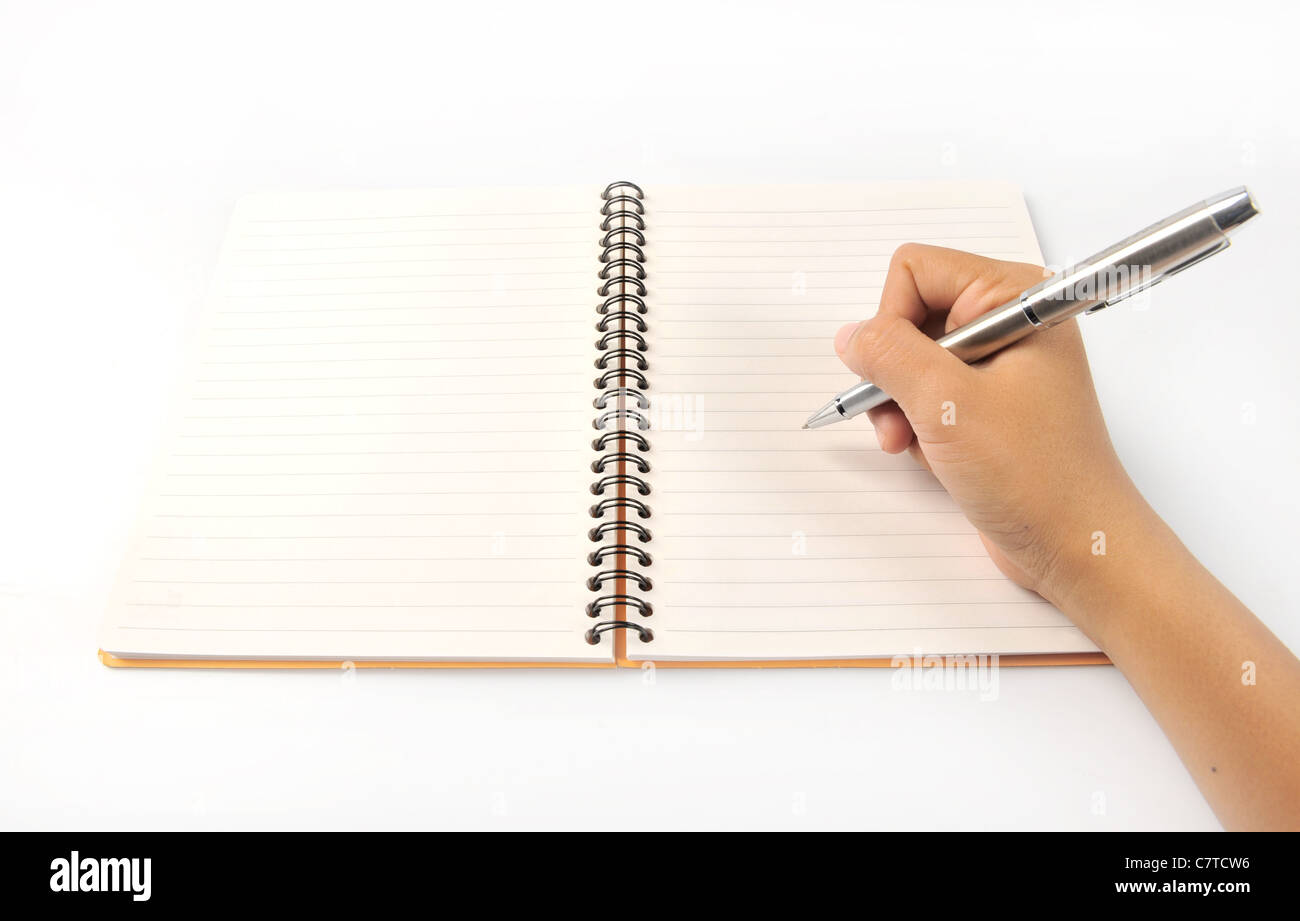 Notebook in hand. Pen in hand. Isolated on white background Stock Photo ...