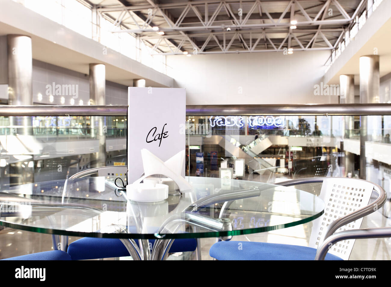 Menu on glass table close-up at modern cafe Stock Photo - Alamy
