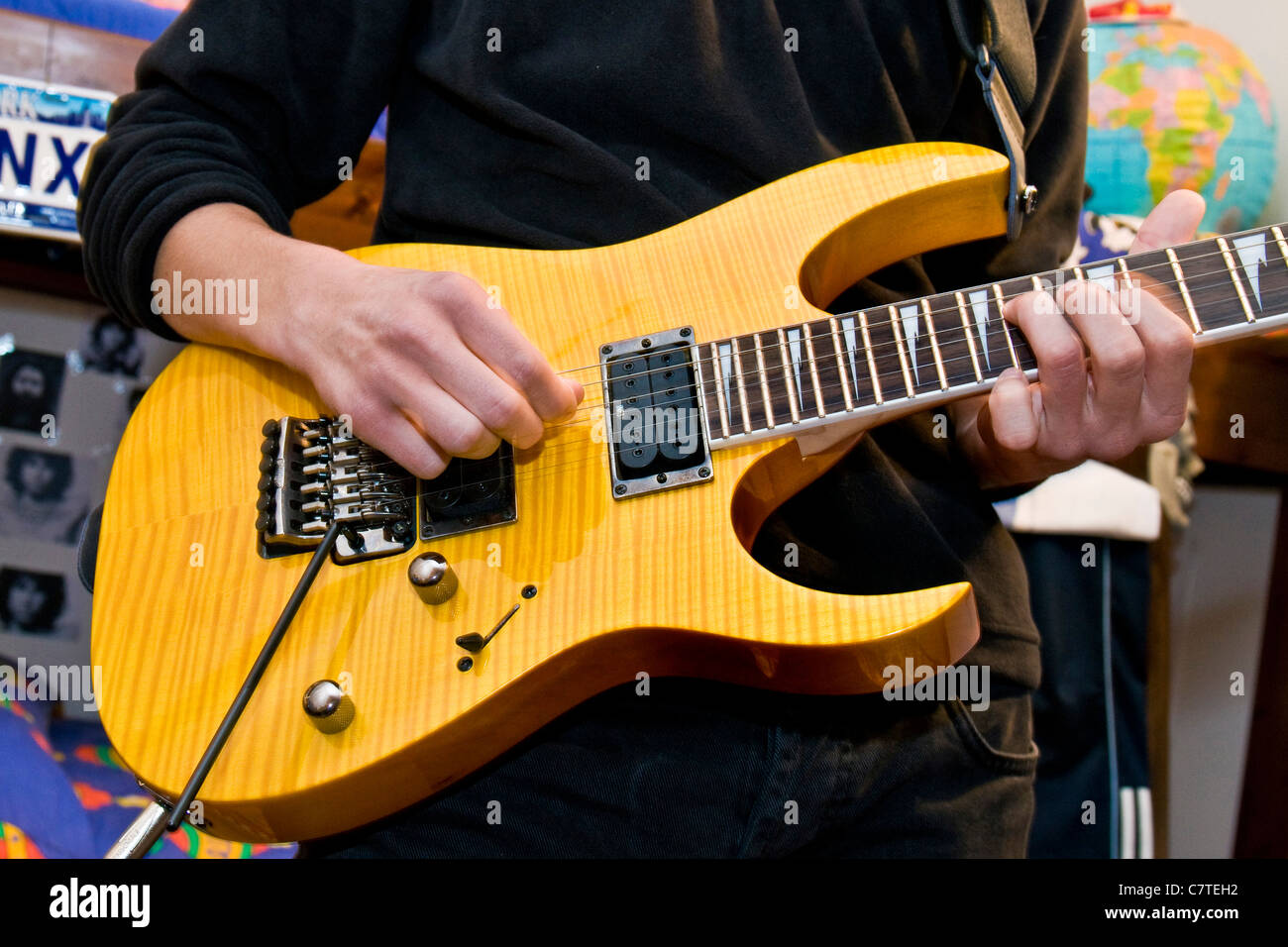 Playing bass guitar Stock Photo - Alamy