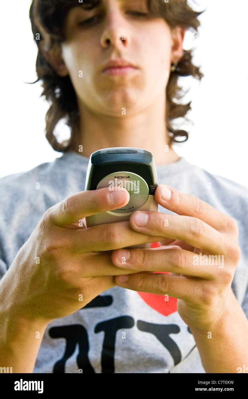 Teenage boy with mobile phone Stock Photo - Alamy
