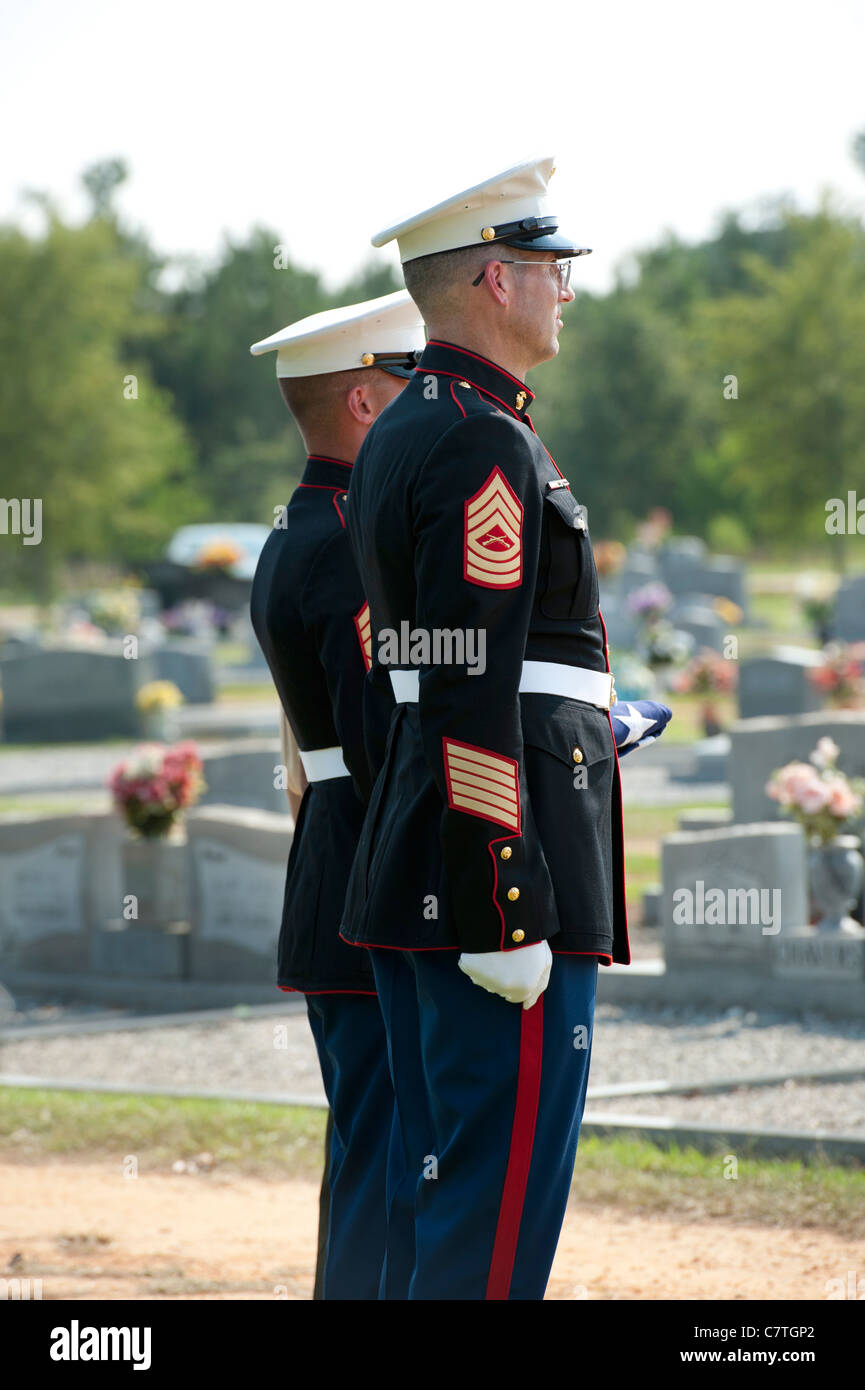 Marines standing at attention during the funeral of fallen Marine Lance ...