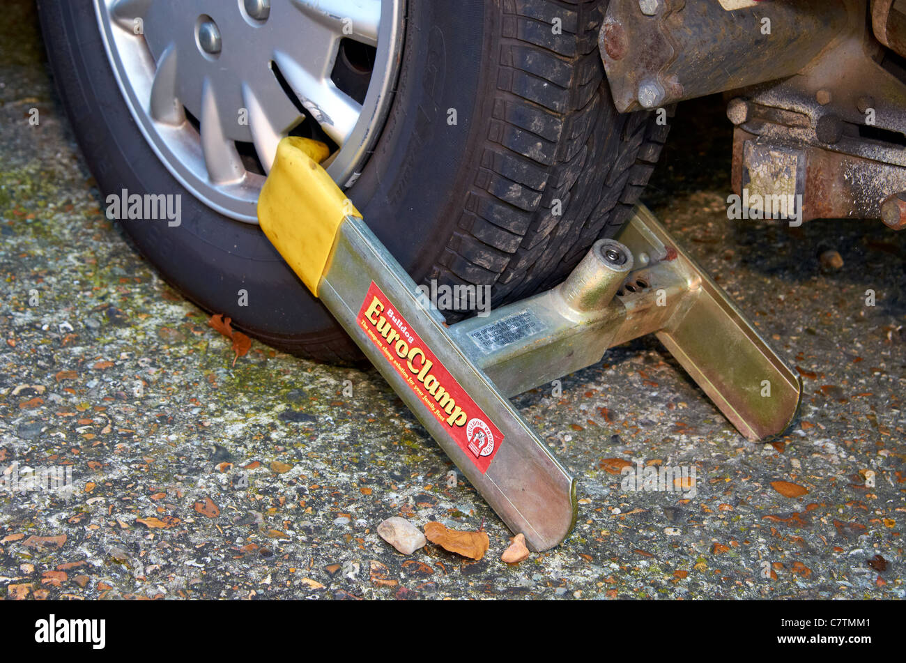 Lightweight wheel clamp attached to a caravan wheel. (note - wheel also ...