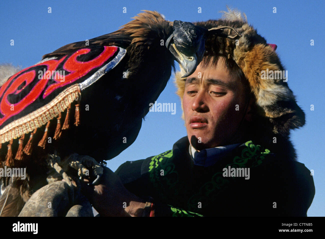 Mongolia, Altai Mt. Region. Man with eagle Stock Photo - Alamy
