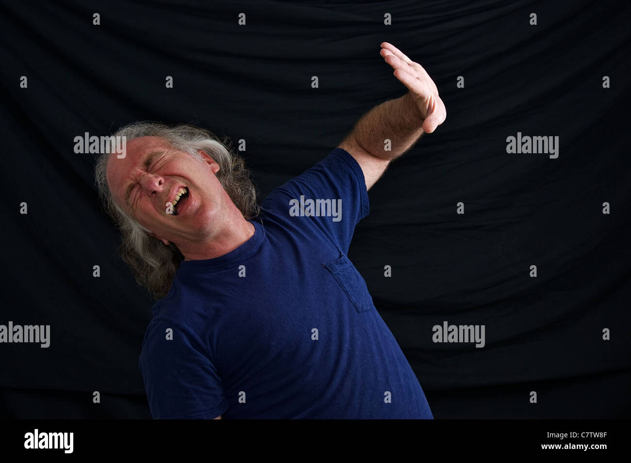 Cowering fear hi-res stock photography and images - Alamy