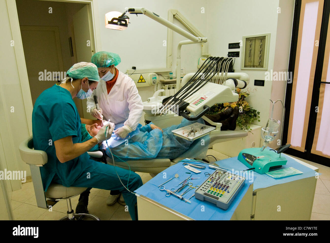 Patient receiving dental treatment Stock Photo - Alamy