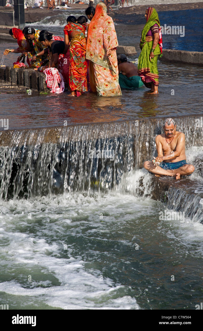 Man bathing in the sacred waters of the Godavari river. Ram Kund. Nasik ...