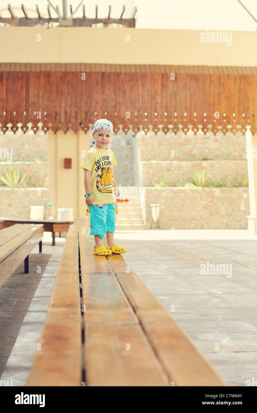 boy on bench Stock Photo - Alamy