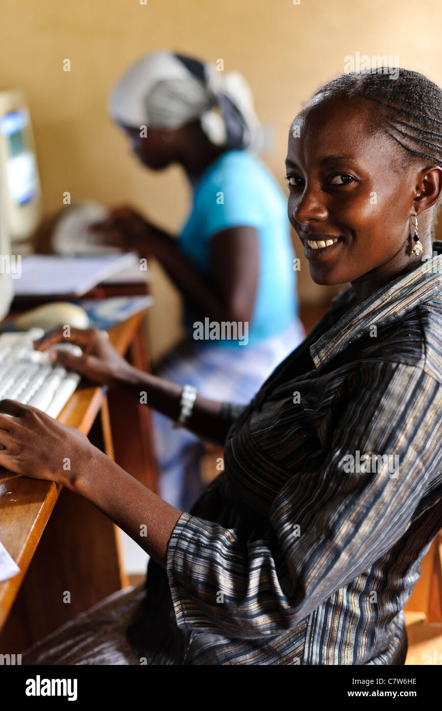 Adults learning computer skills during a computer class, Meserani ...
