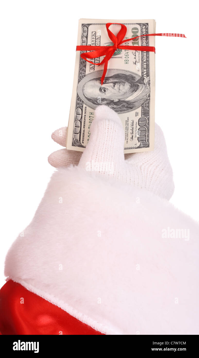 Money in hand of Santa Claus Stock Photo - Alamy