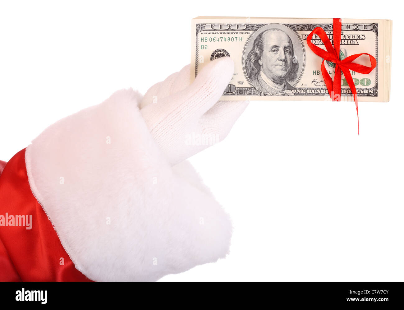 Money in hand of Santa Claus Stock Photo - Alamy