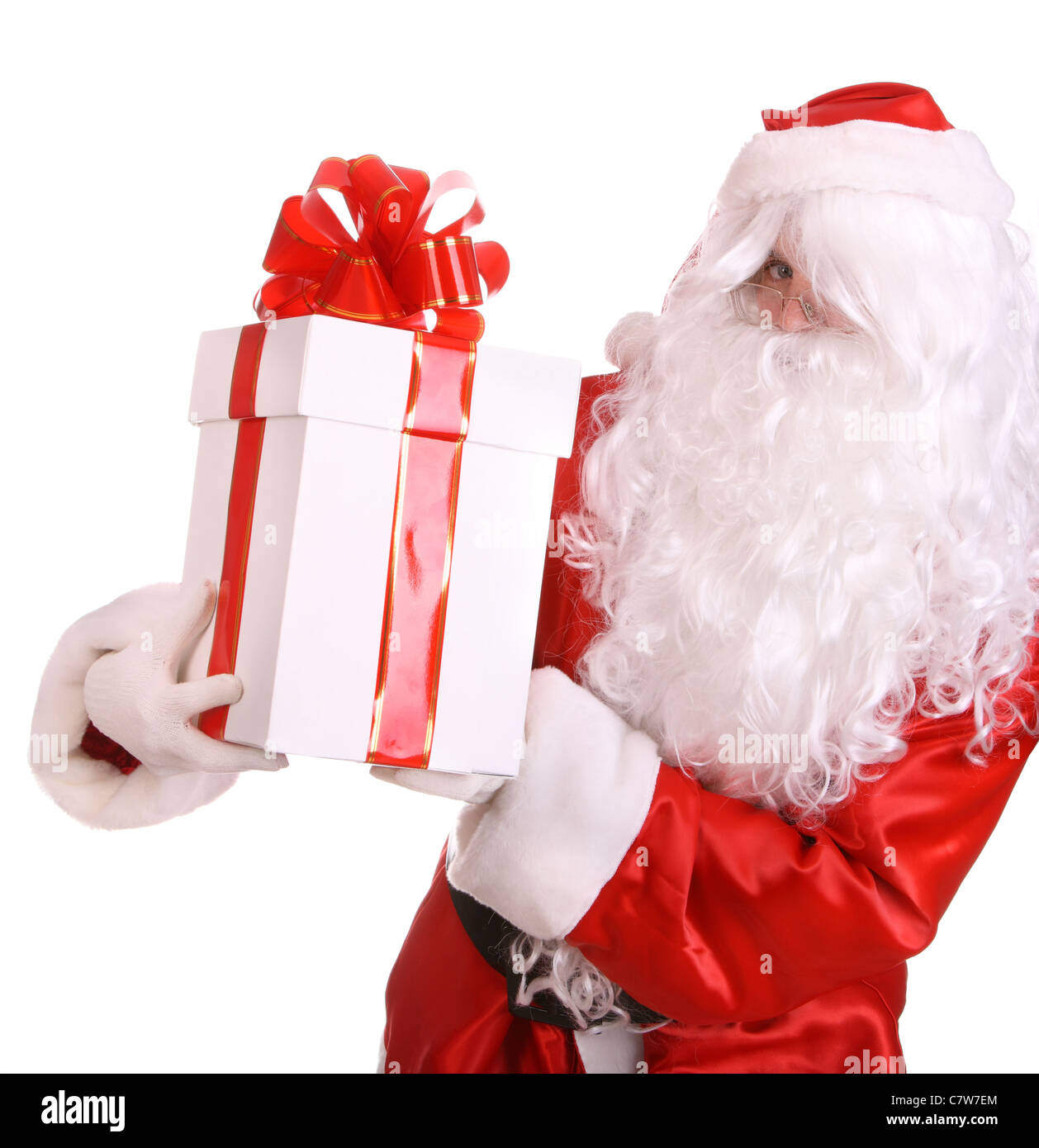 Santa Claus giving big Christmas gift box Stock Photo - Alamy