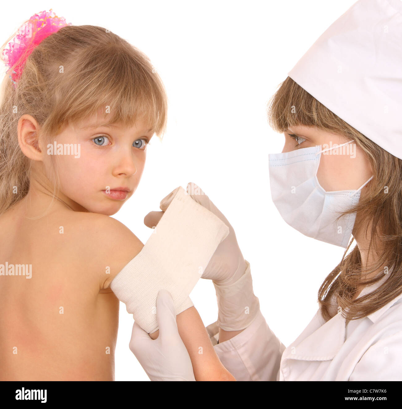 Doctor give first aid of child Stock Photo - Alamy