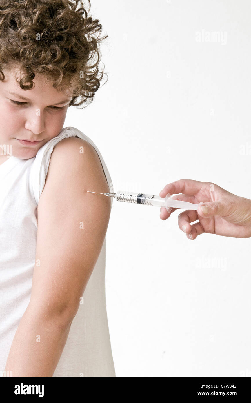 Boy having injection Stock Photo - Alamy