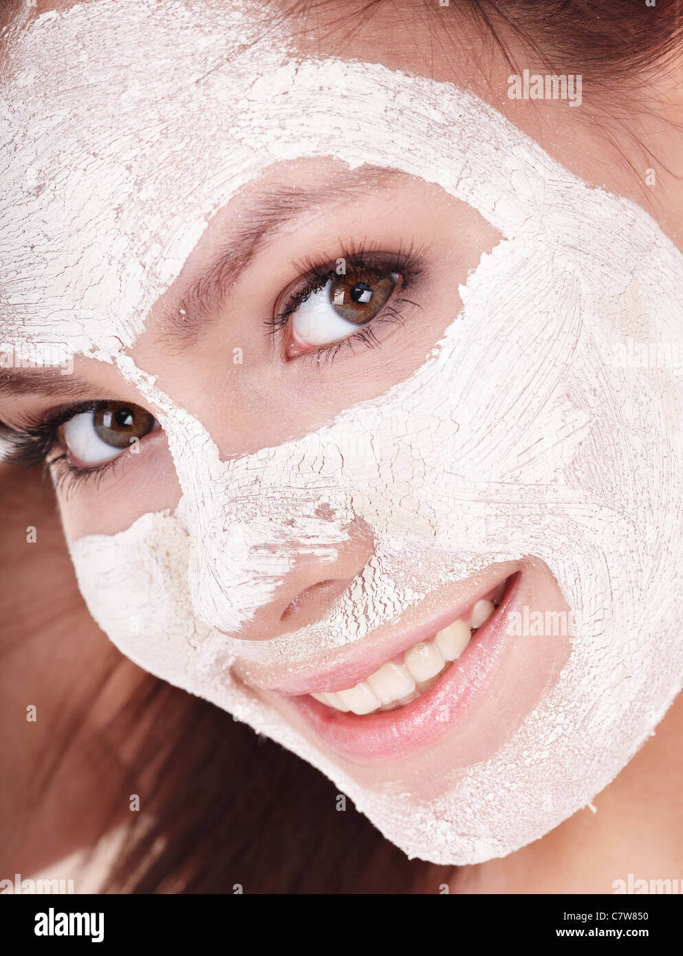 Woman with clay facial mask Stock Photo - Alamy