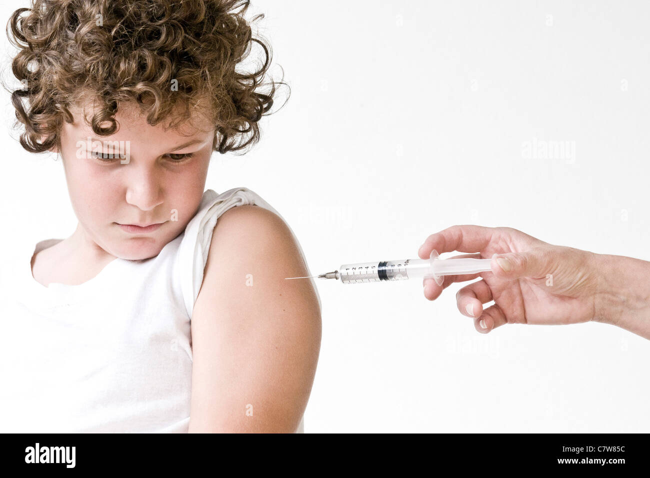 Boy having injection Stock Photo - Alamy
