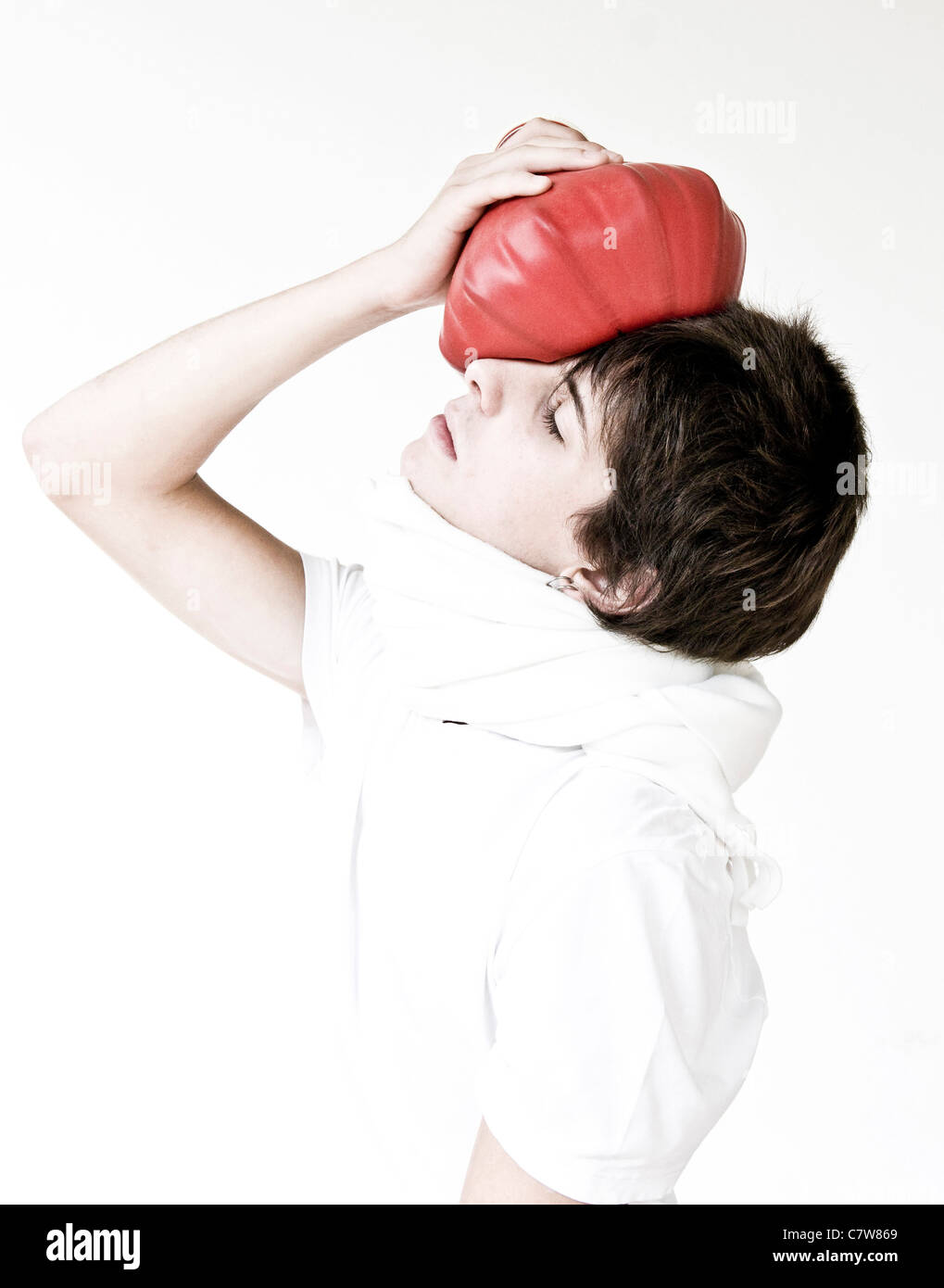 Teenage boy with ice pack Stock Photo - Alamy