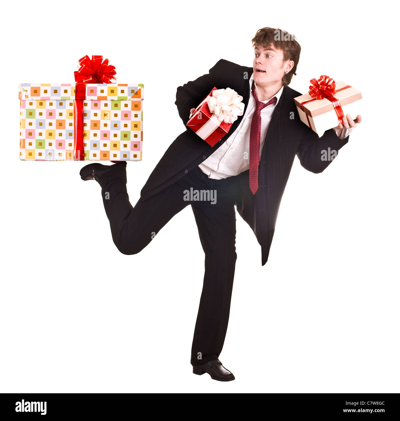 Man with falling gift box run Stock Photo - Alamy