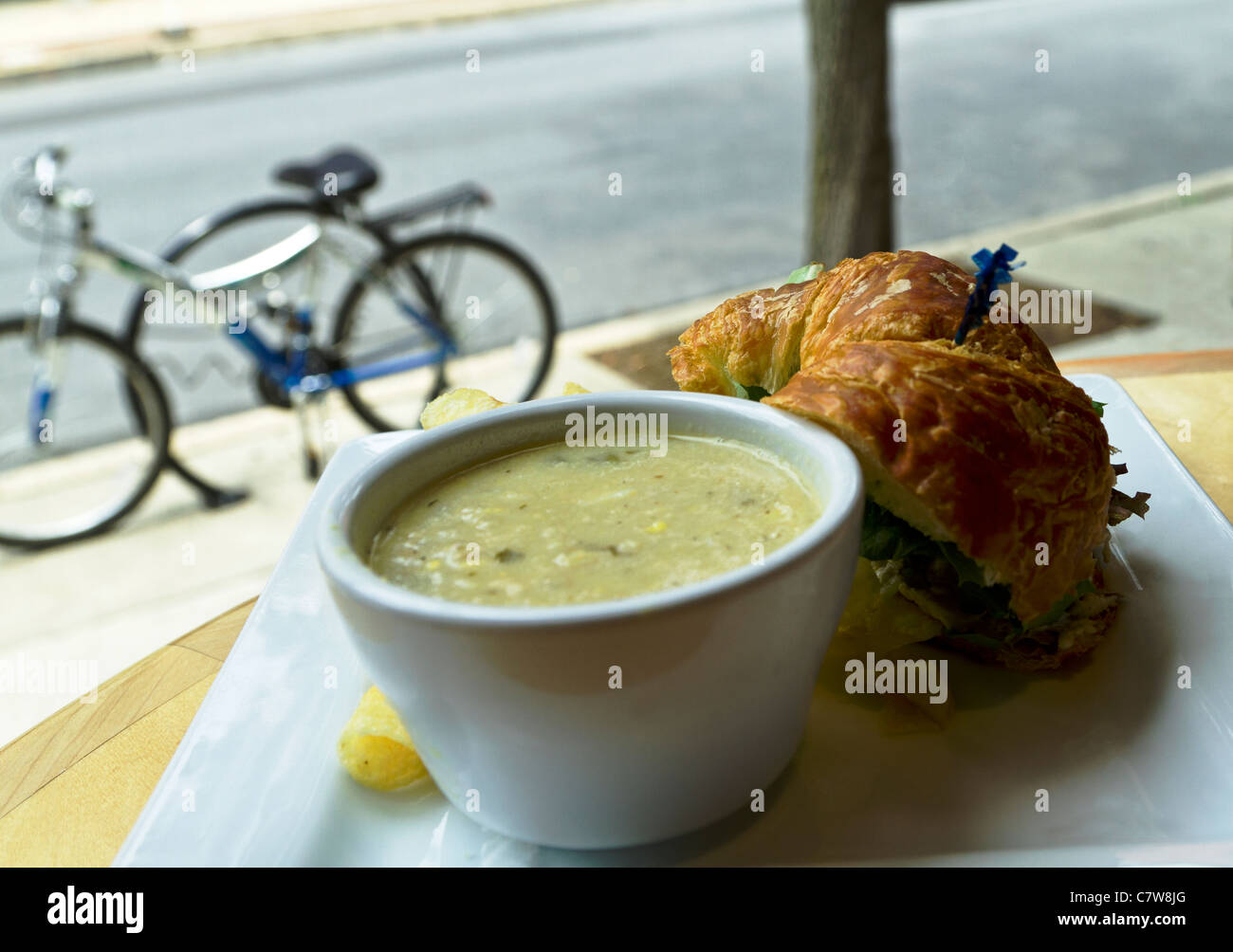 Soup and sandwich stop with bicycle parked outside restaurant window ...