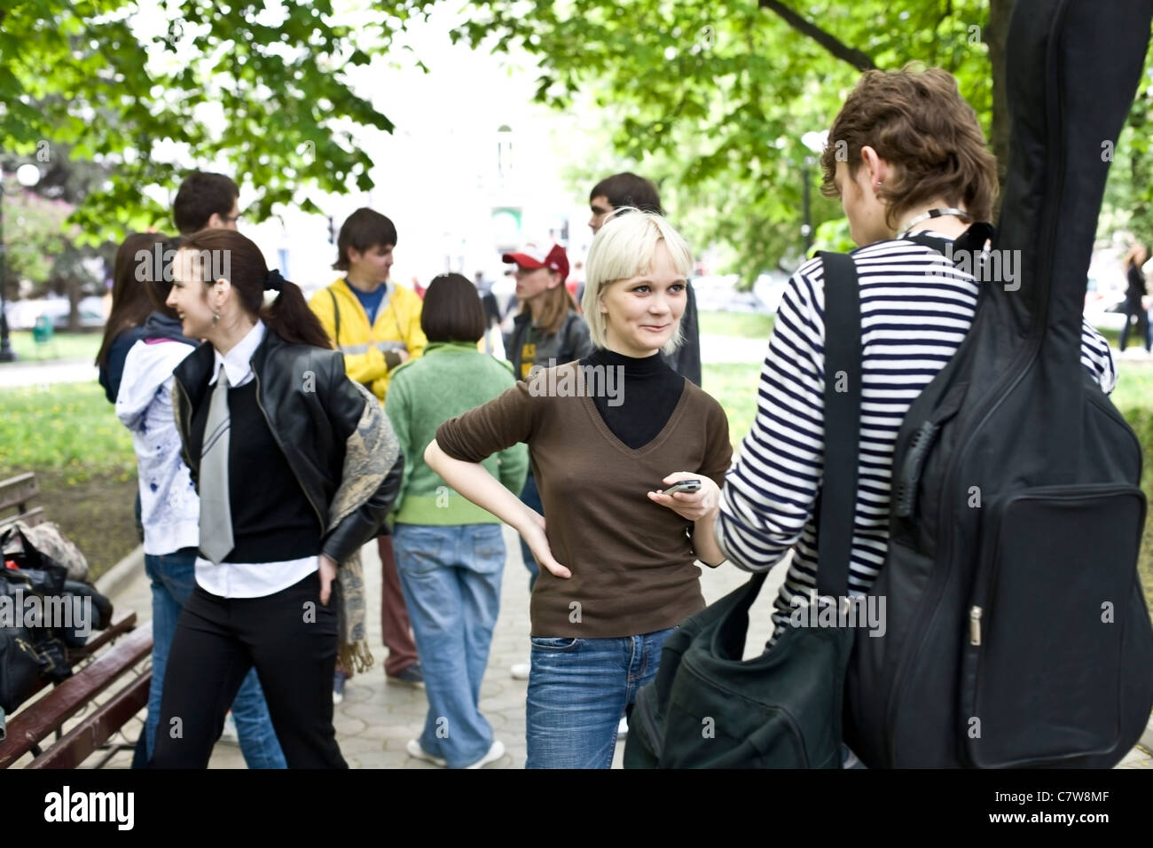 Group of student on outdoor. Music. Problem Stock Photo - Alamy