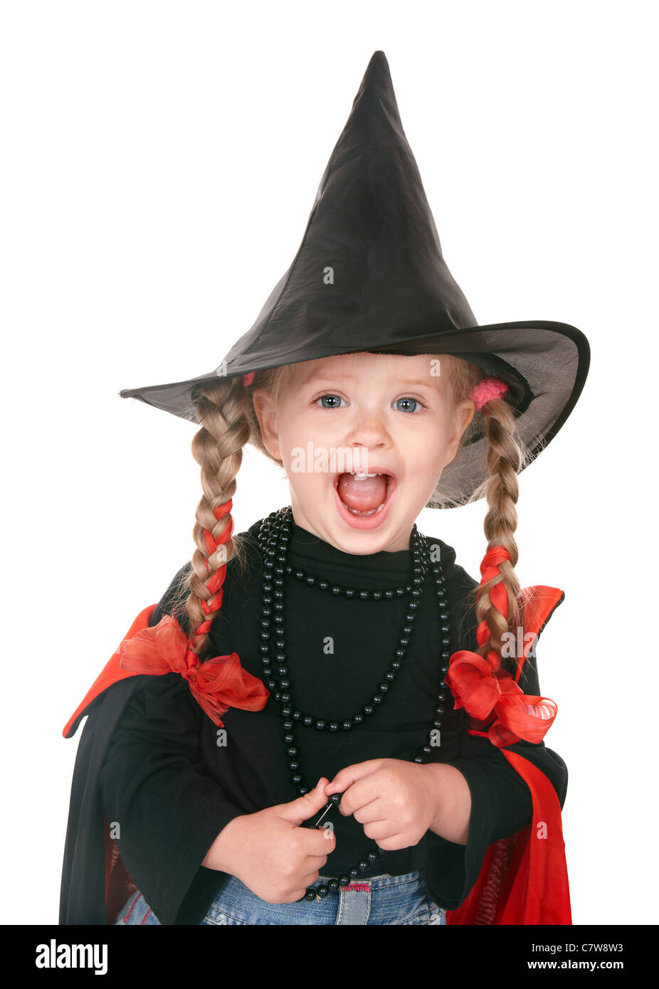 Little girl witch in black hat Stock Photo - Alamy