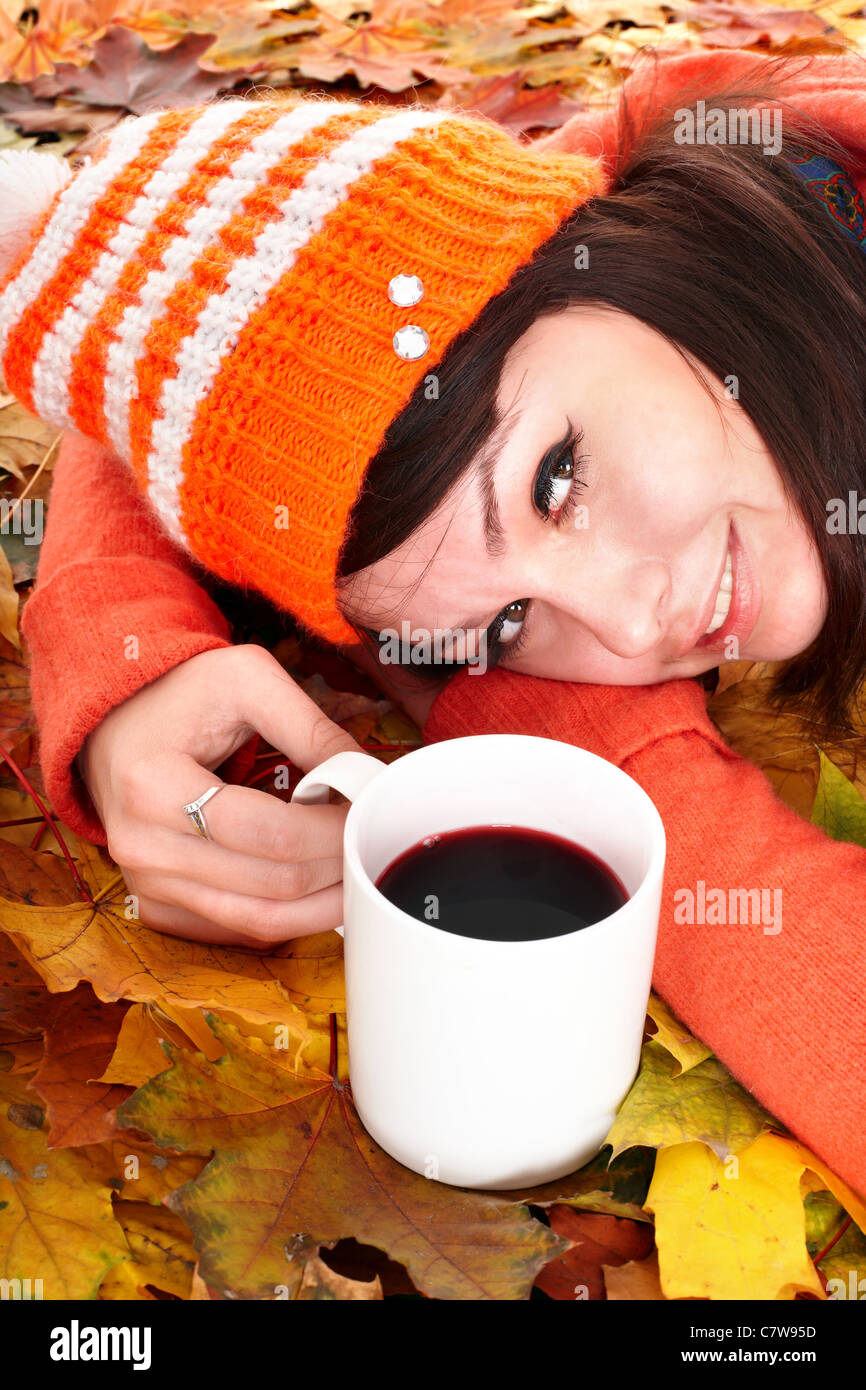 Young woman in autumn orange leaves. Outdoor Stock Photo - Alamy