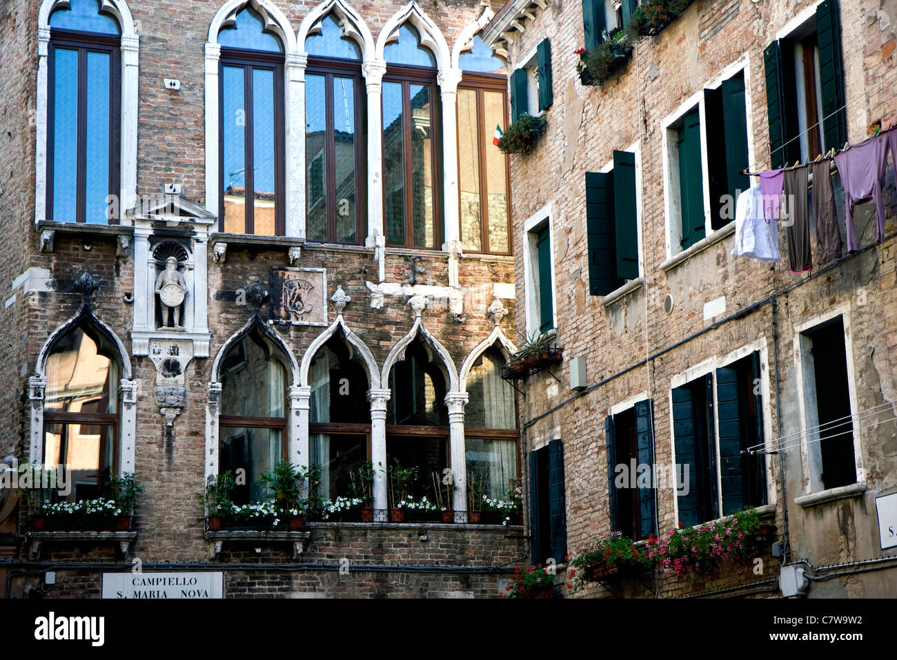 Buildings with traditional Venetian windows in Venice, Italy Stock ...