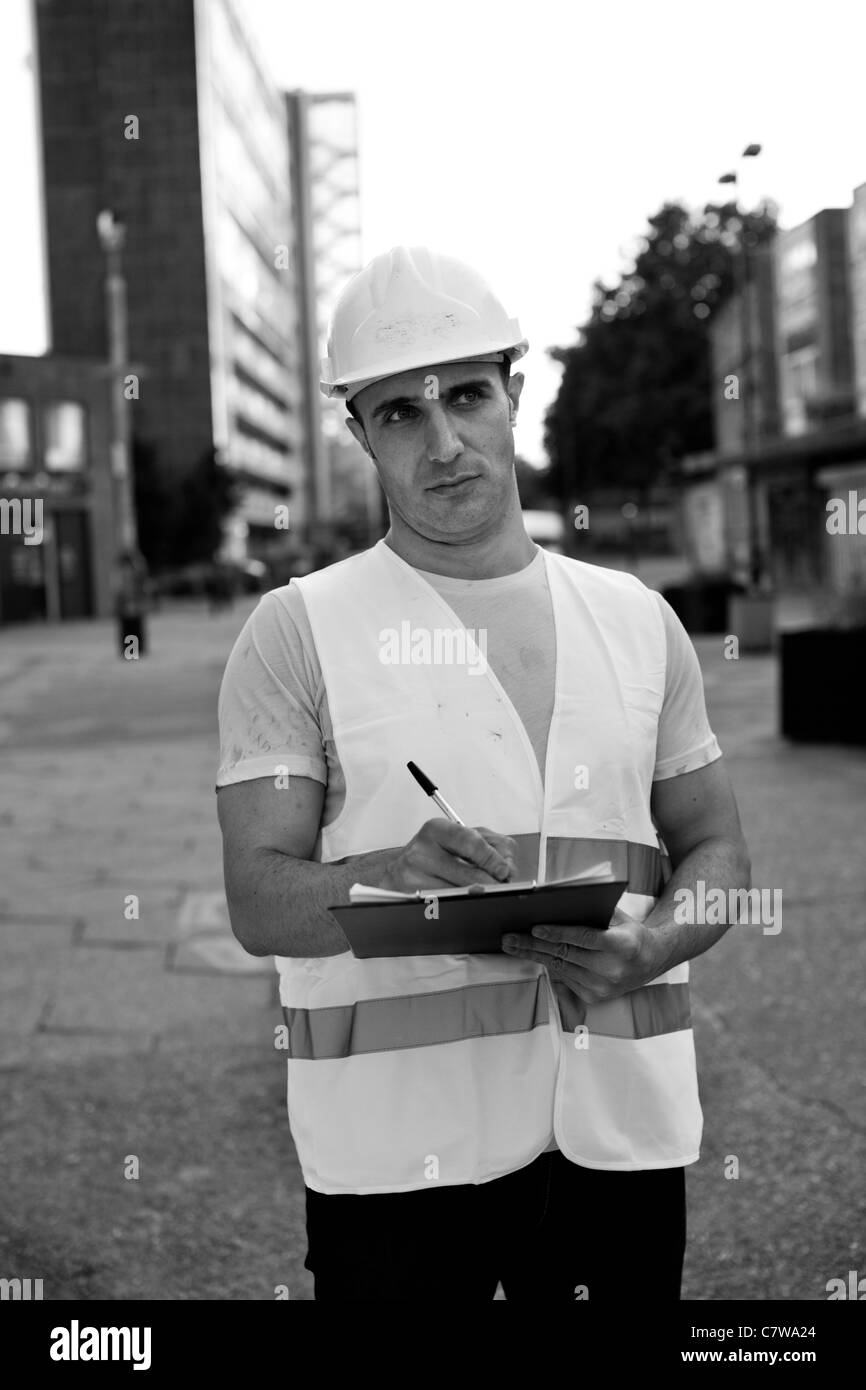 Smiling contractor building site Black and White Stock Photos & Images ...