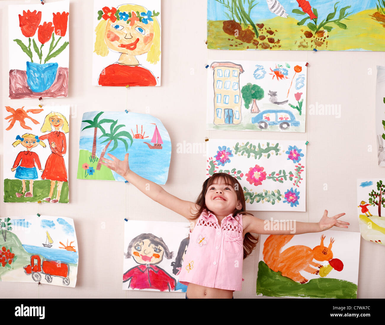 Little girl drawing pencil in play room Stock Photo - Alamy
