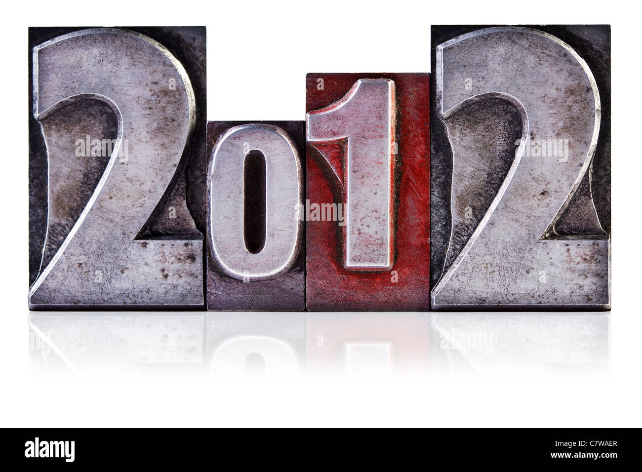 Photo of the number 2012 in old metal letterpress, isolated on a white ...
