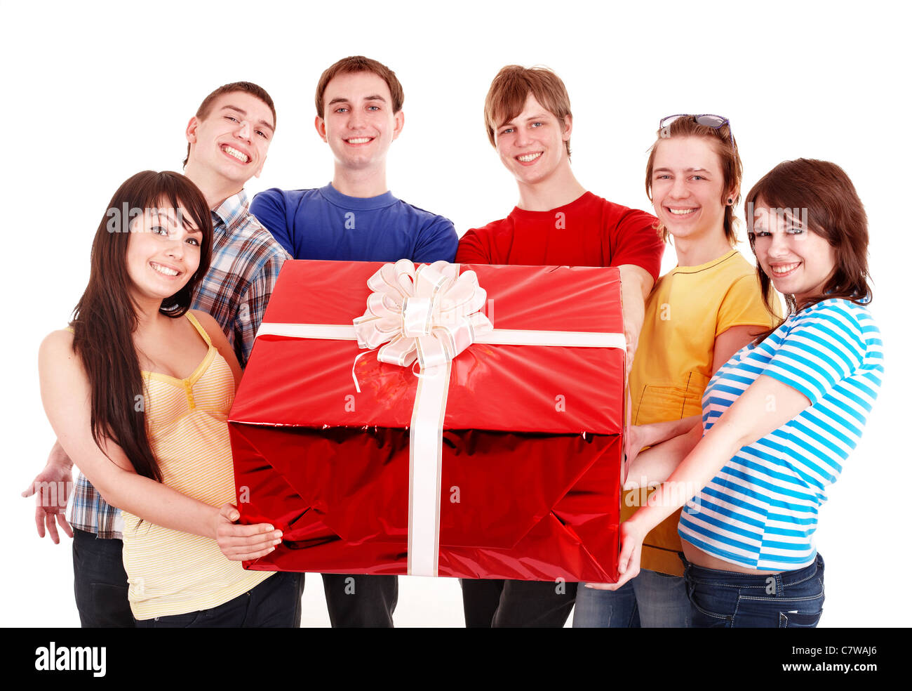 Group of people with big red gift box Stock Photo - Alamy