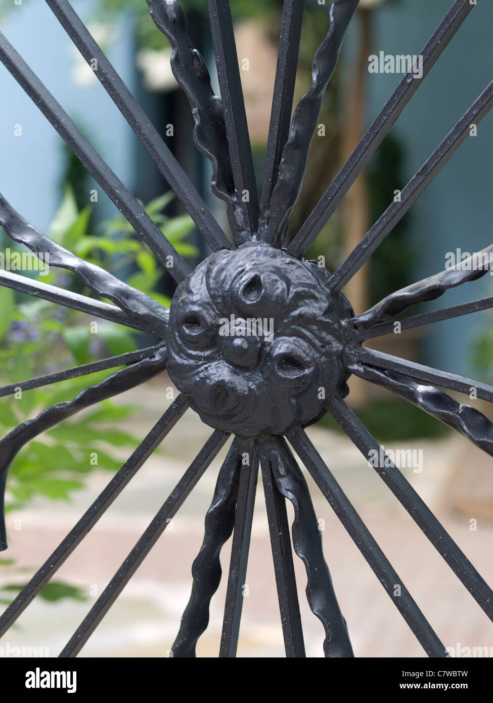 Iron gate in front of a colorful Georgian Row House on Rainbow Row in ...