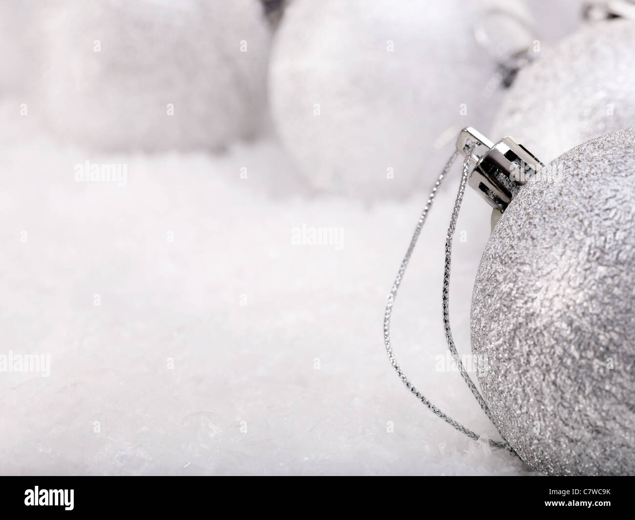 Group of Christmas ball in snow Stock Photo - Alamy