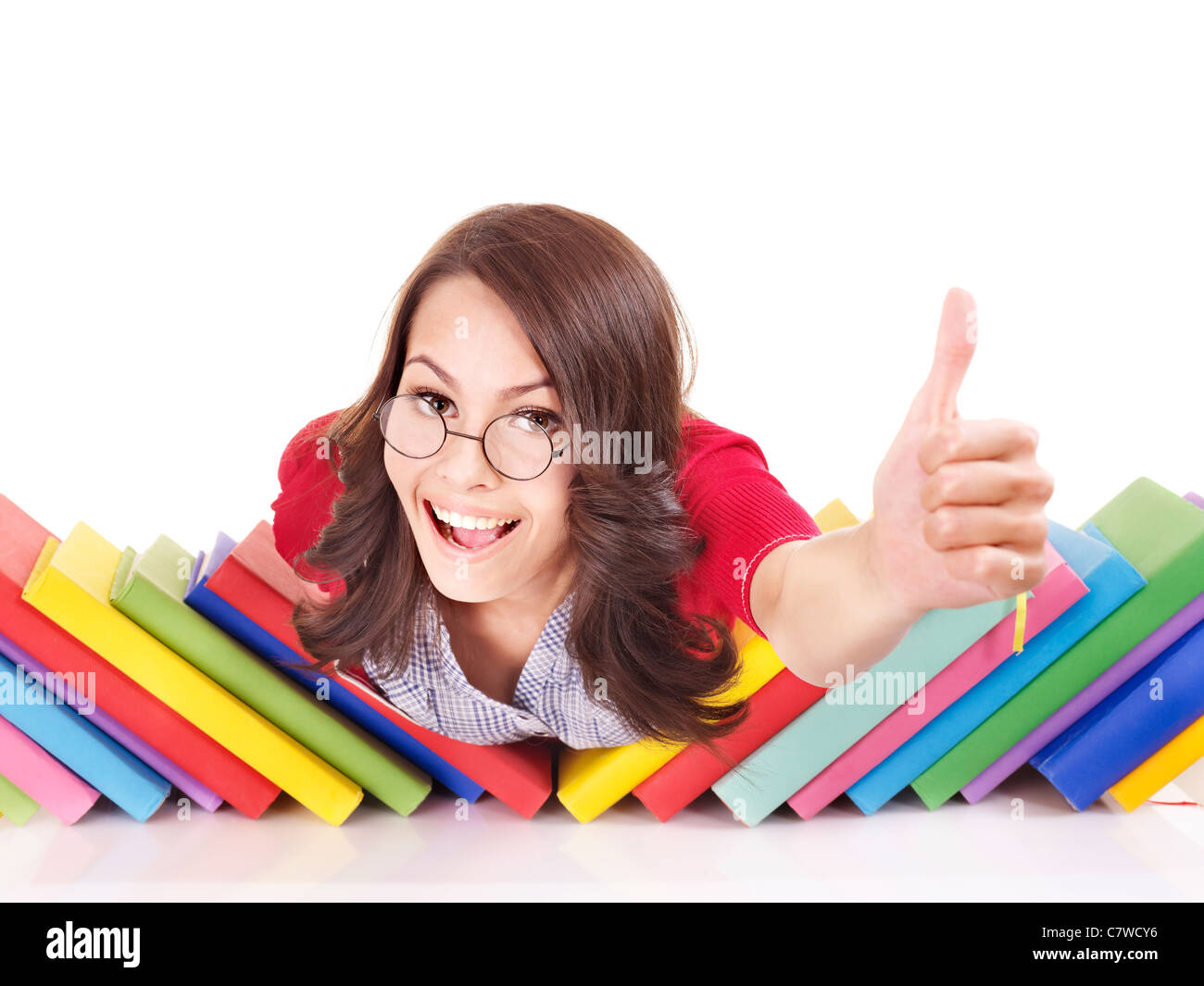 Girl with stack book showing thumb up Stock Photo - Alamy