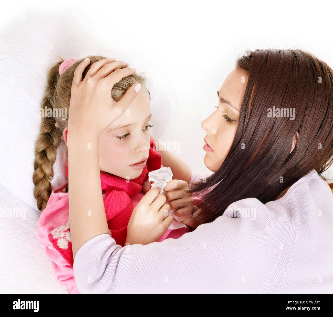 Doctor checking temperature of child Stock Photo - Alamy