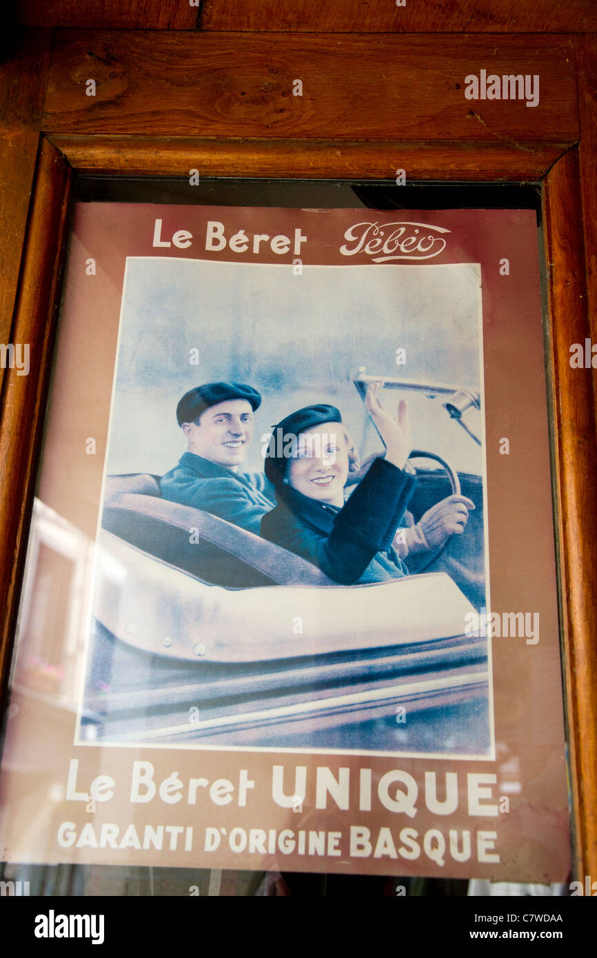 France store window beret hat couple poster Stock Photo - Alamy