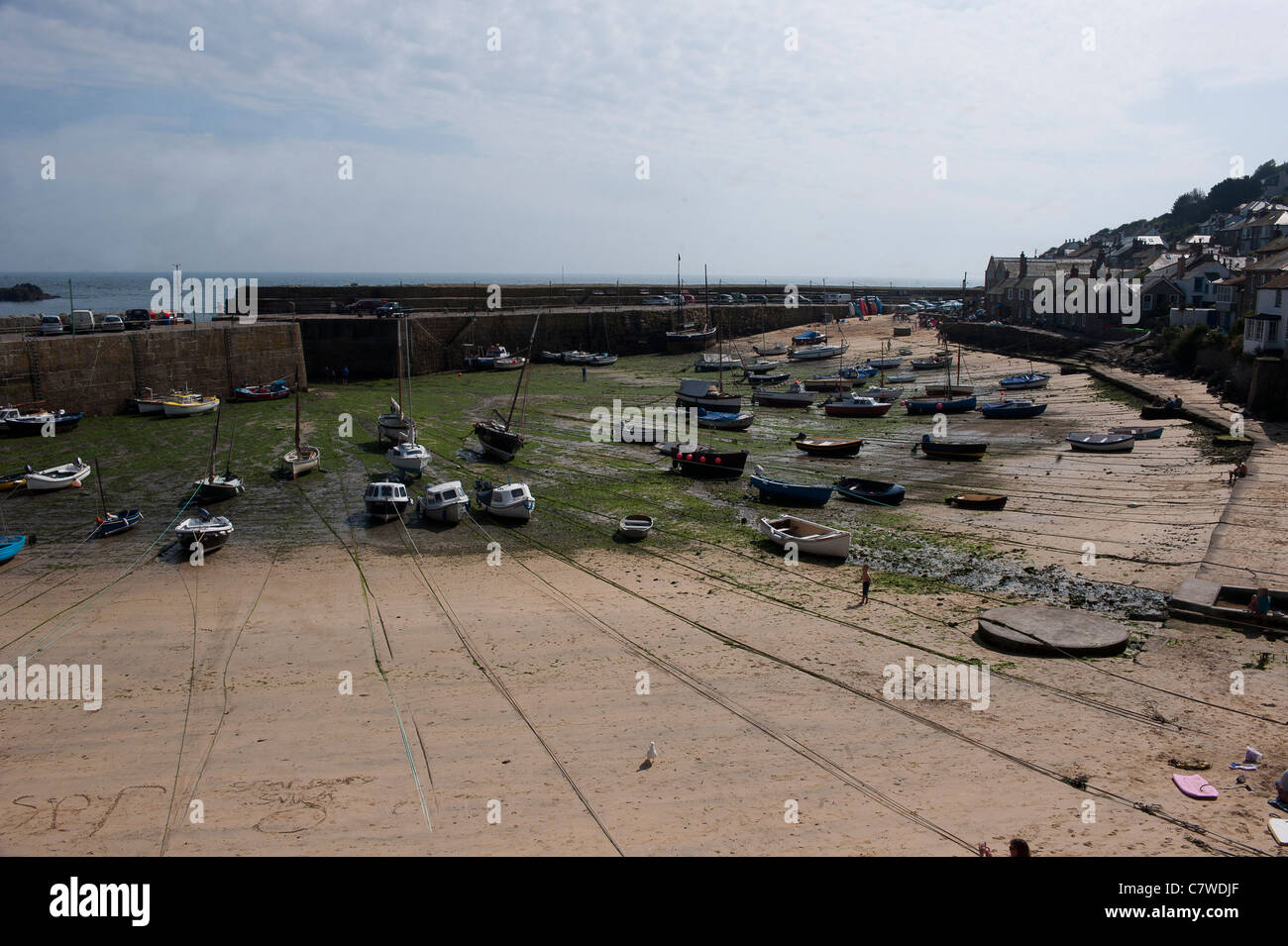 Fishing boats at a small port in a village hi-res stock photography and ...