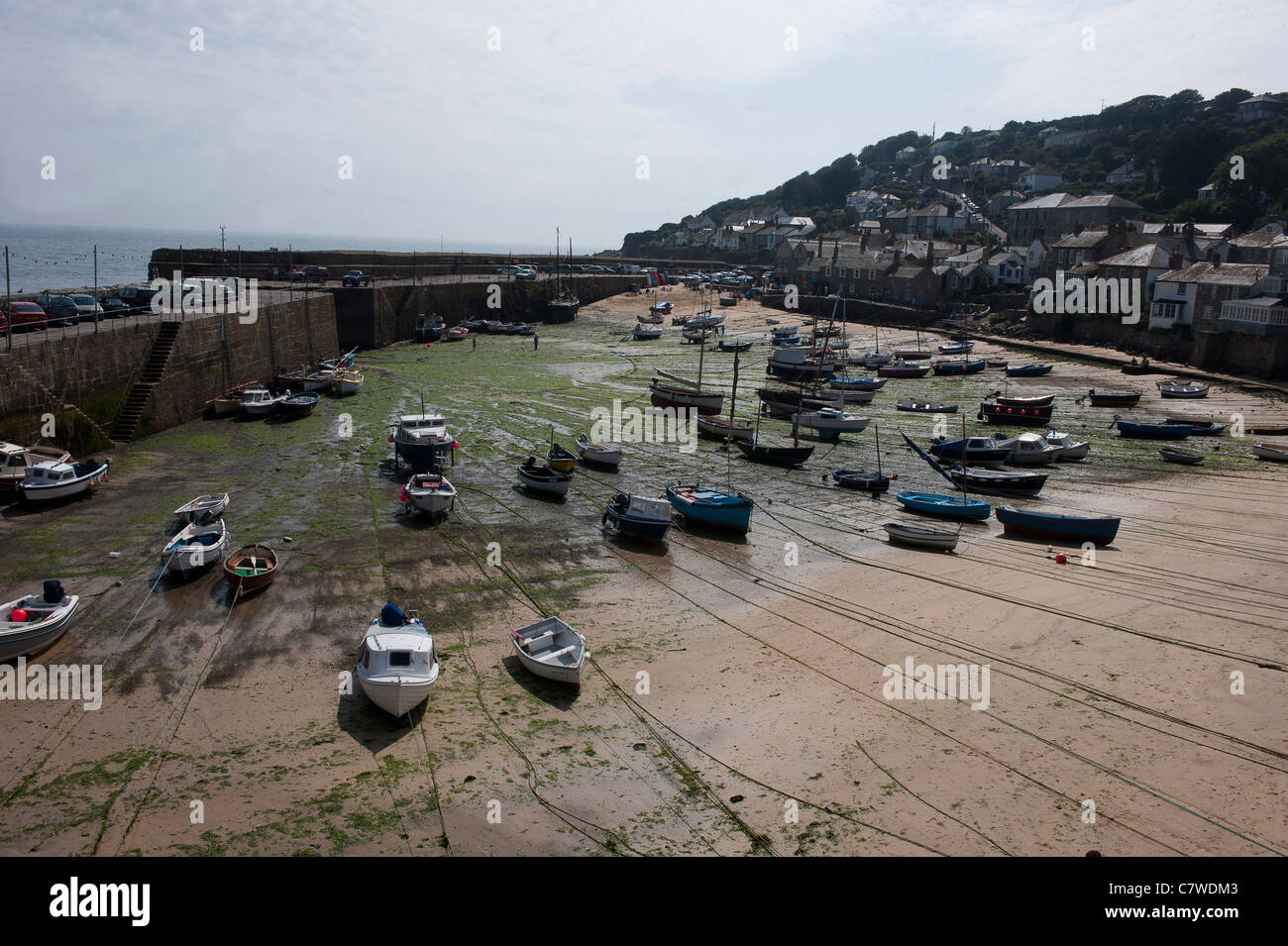 Fishing boats at a small port in a village hi-res stock photography and ...