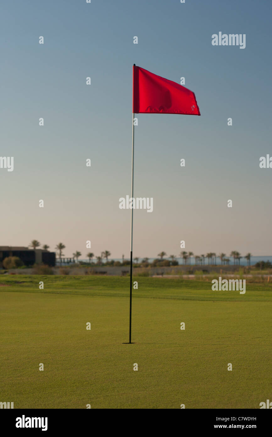 Red golf flag on hi-res stock photography and images - Alamy