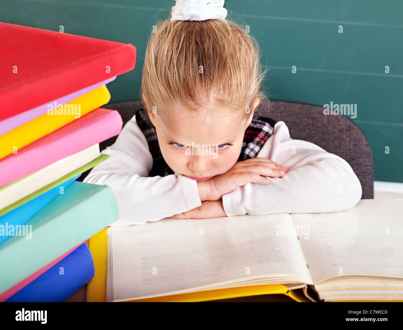 Unhappy school girl and class room hi-res stock photography and images ...