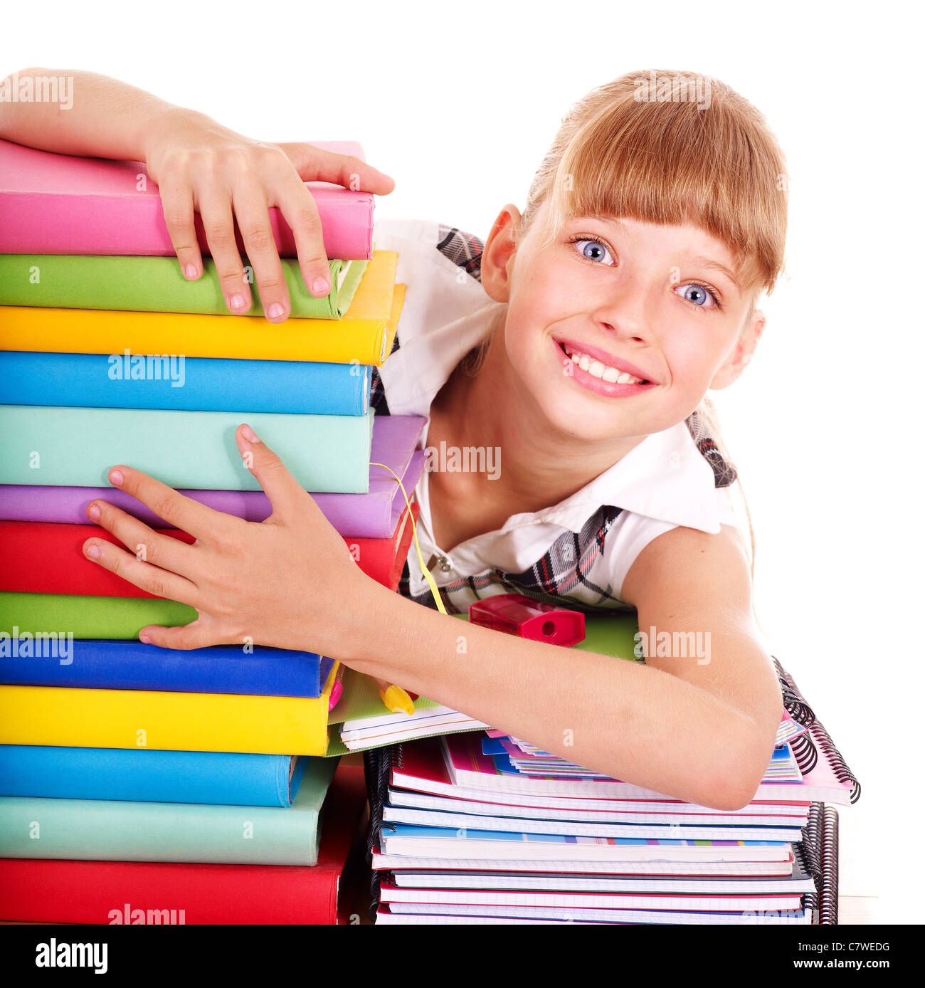 School child holding stack of books Stock Photo - Alamy